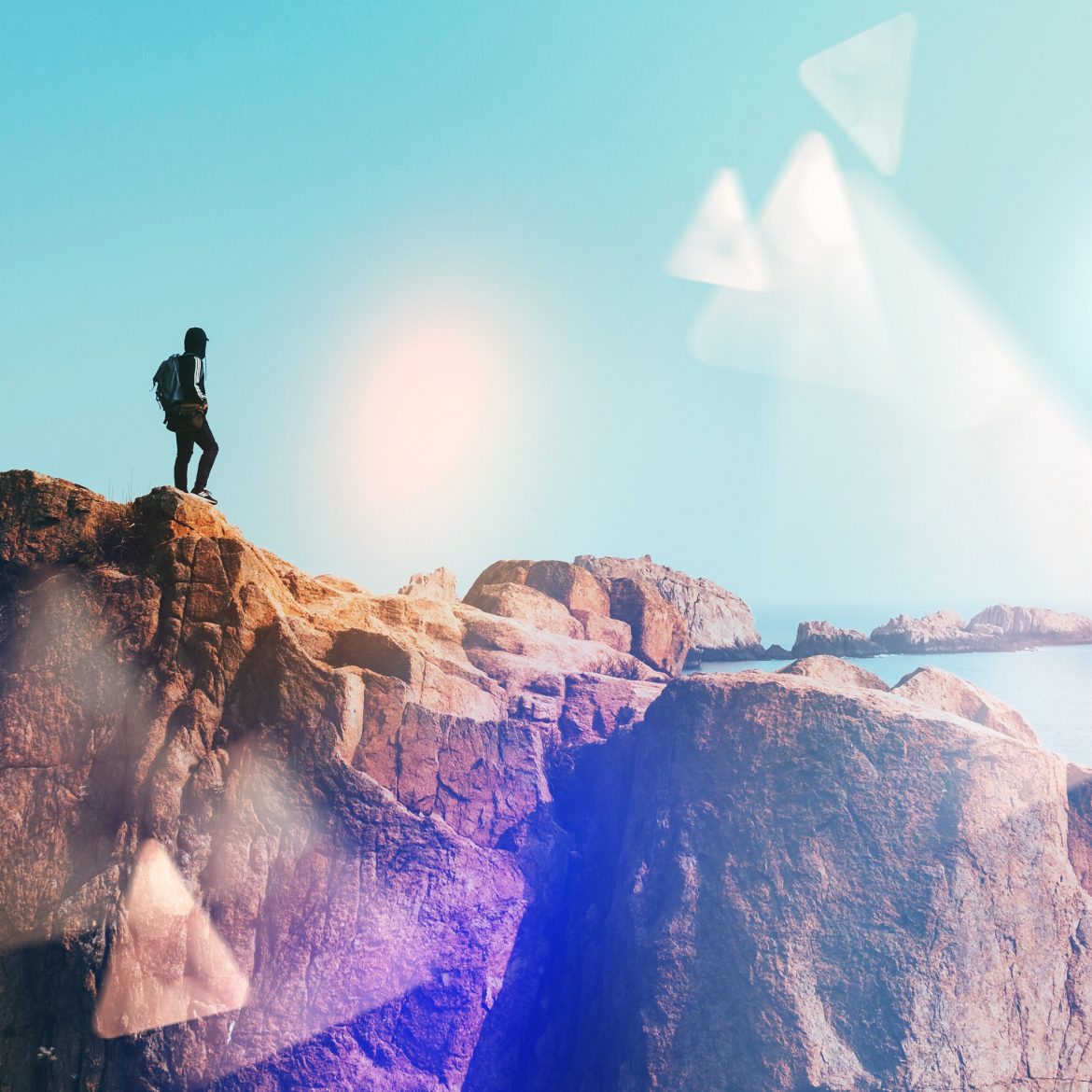 Bokeh Mask on the photo of a man on the rock - Picsart Blog